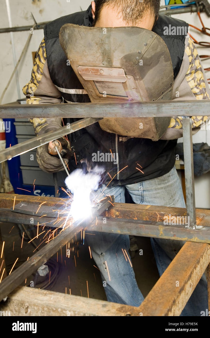 metalworker at work in his workshop Stock Photo - Alamy