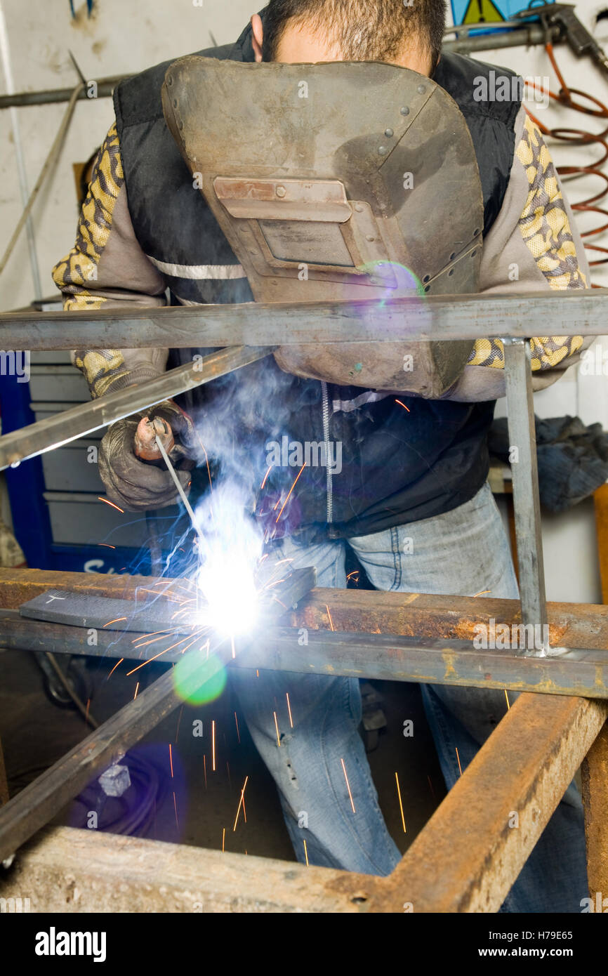 metalworker at work in his workshop Stock Photo - Alamy