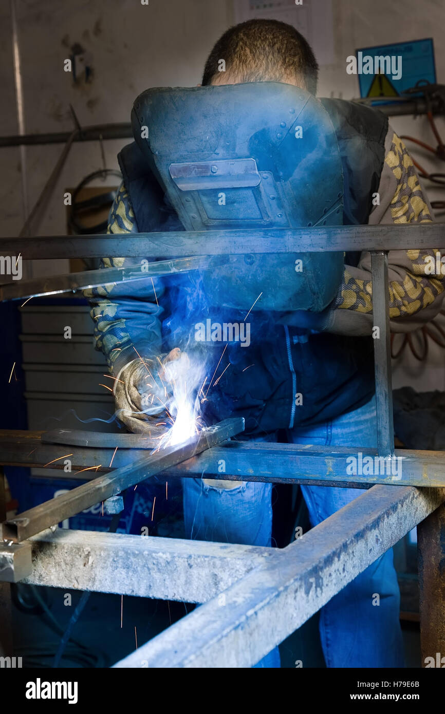 metalworker at work in his workshop Stock Photo - Alamy