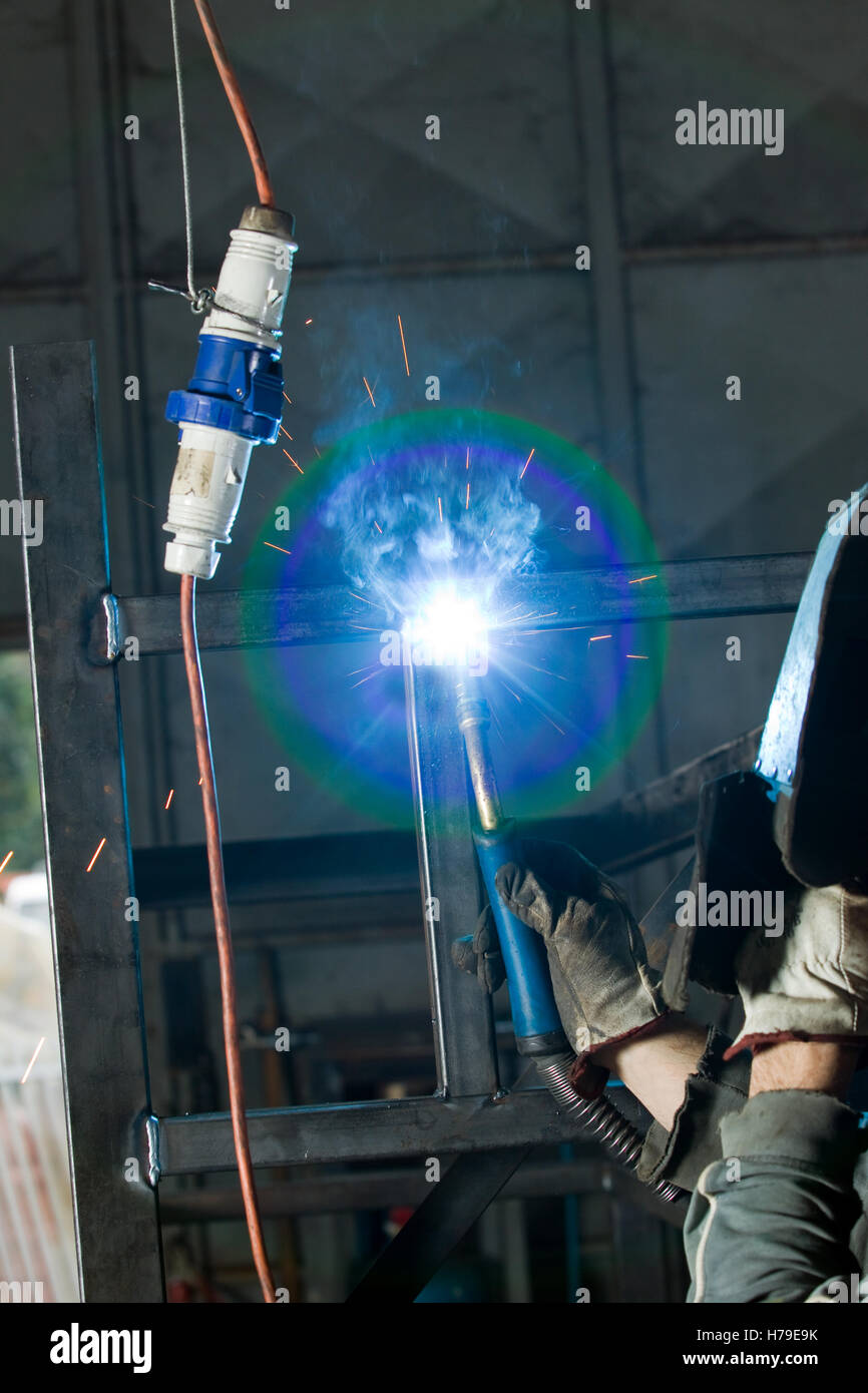 metalworker at work his workshop Stock Photo - Alamy