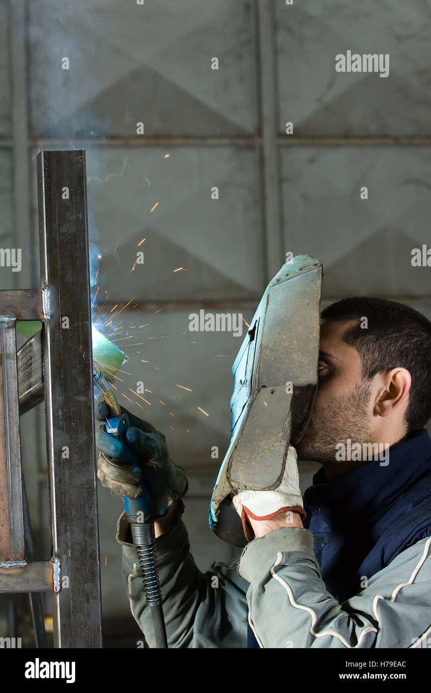 metalworker at work his workshop Stock Photo - Alamy