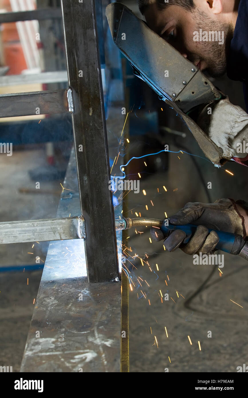 metalworker at work his workshop Stock Photo - Alamy
