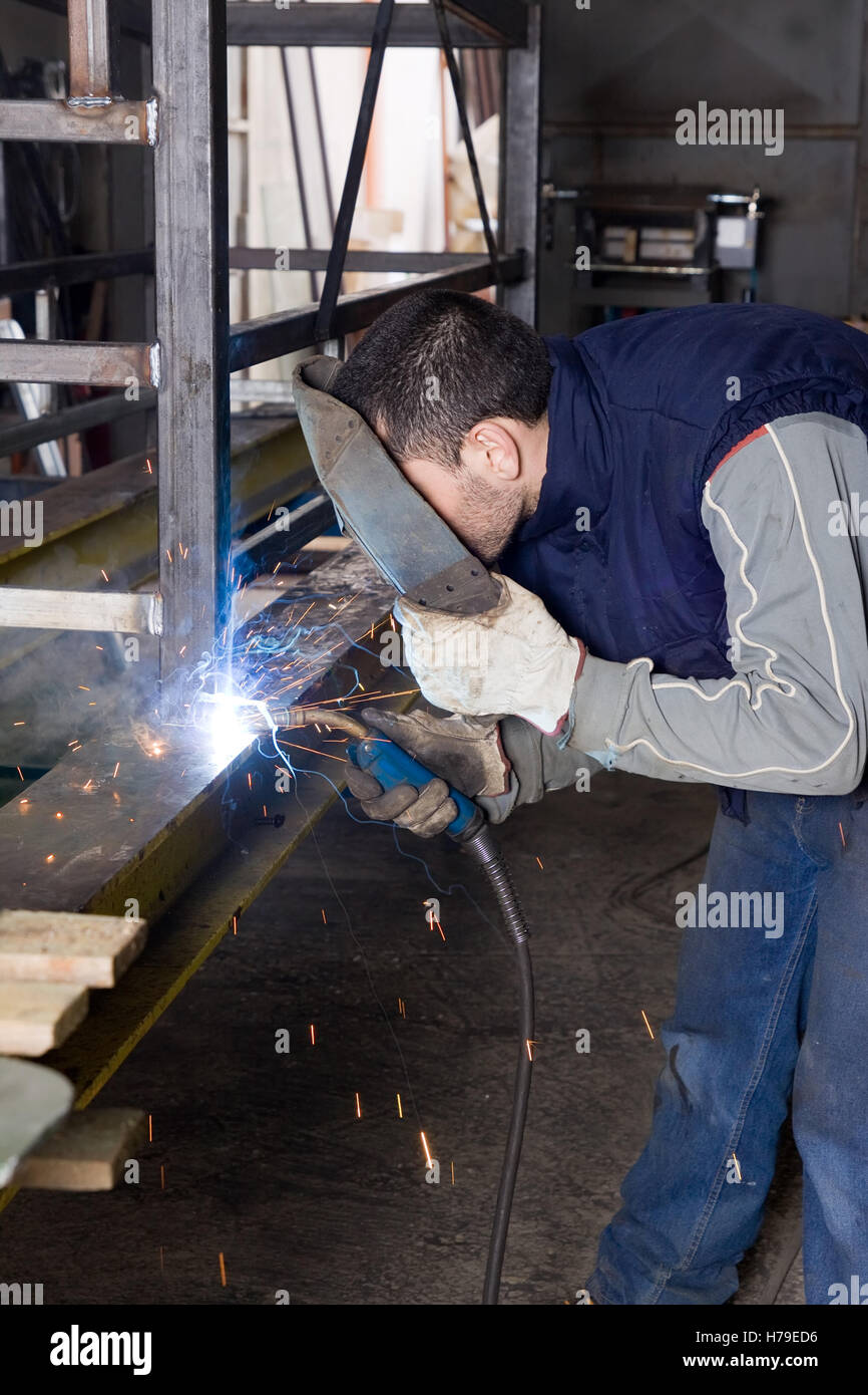 metalworker at work in his workshop Stock Photo - Alamy