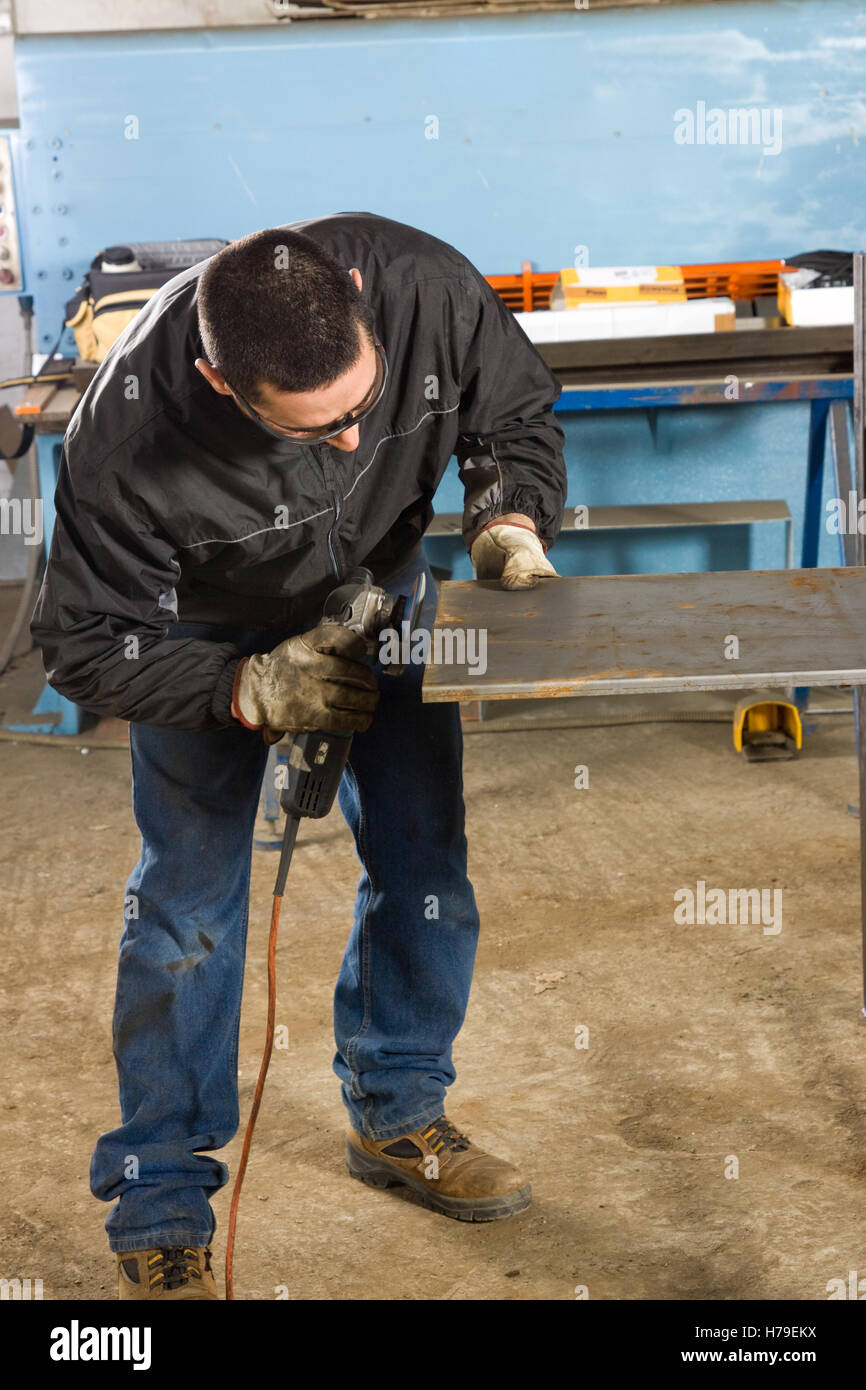 metalworker at work in his workshop Stock Photo - Alamy