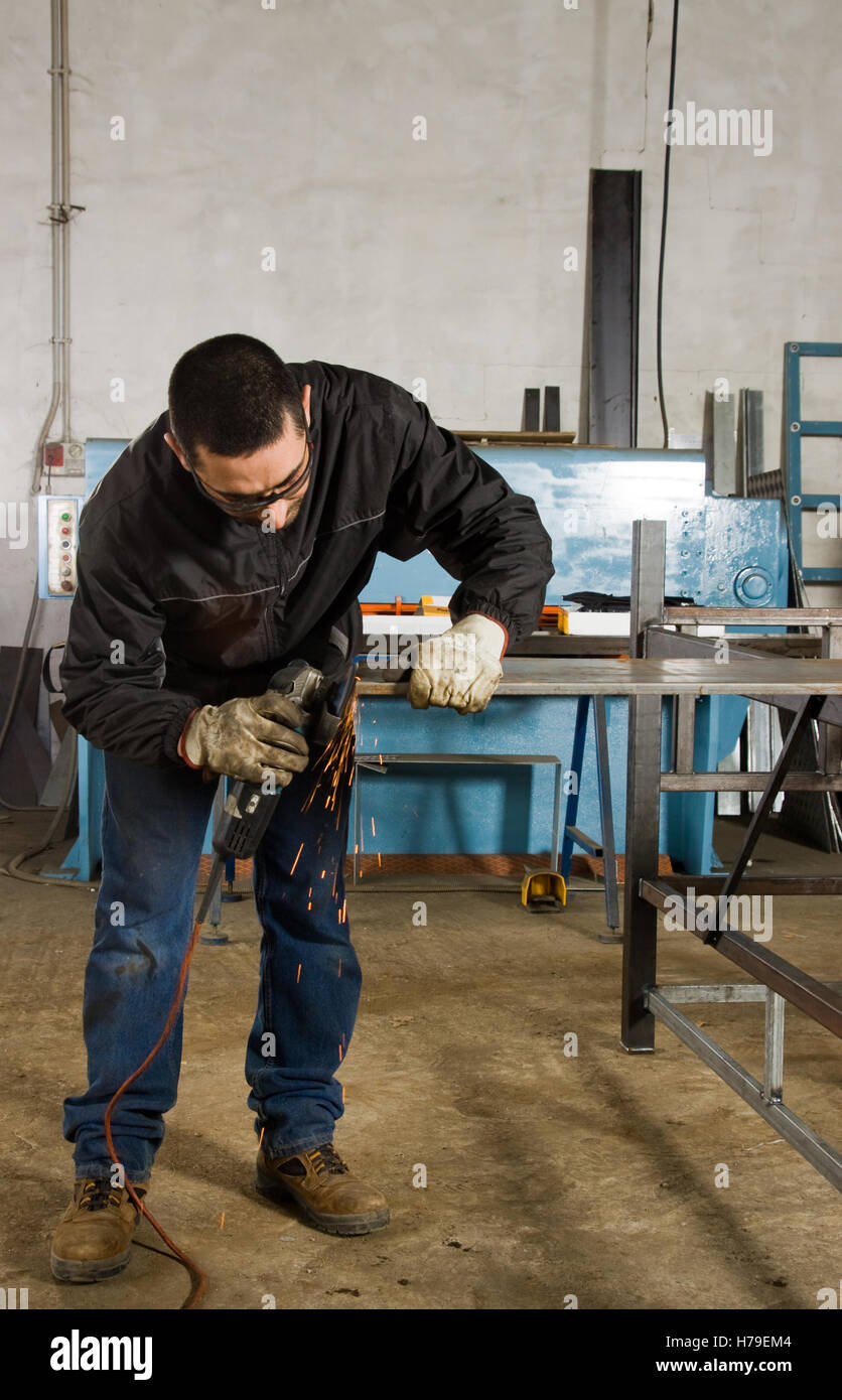 metalworker at work in his workshop Stock Photo - Alamy