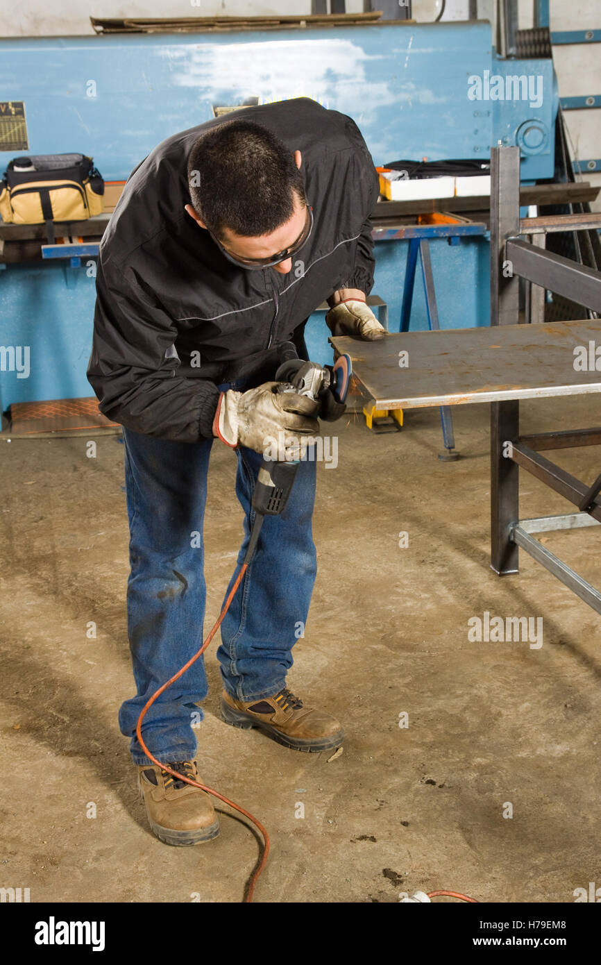 metalworker at work in his workshop Stock Photo - Alamy