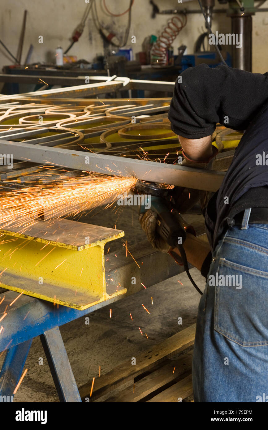 metalworker welding in his workshop Stock Photo - Alamy