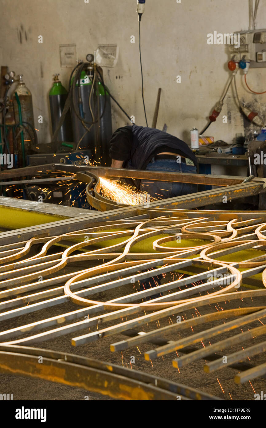 metalworker welding in his workshop Stock Photo - Alamy