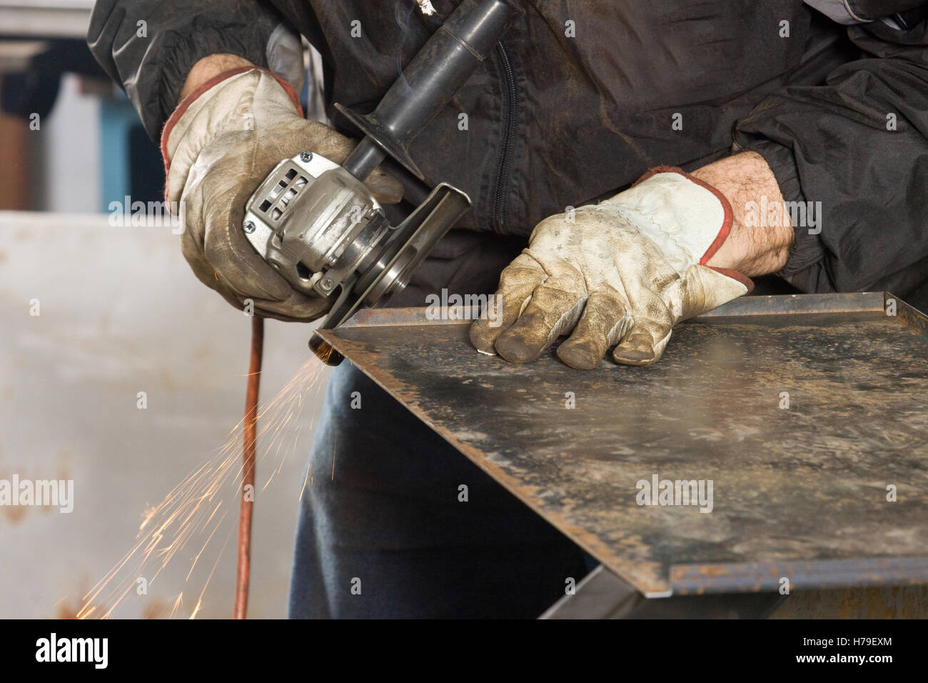 metalworker welding in his workshop Stock Photo - Alamy