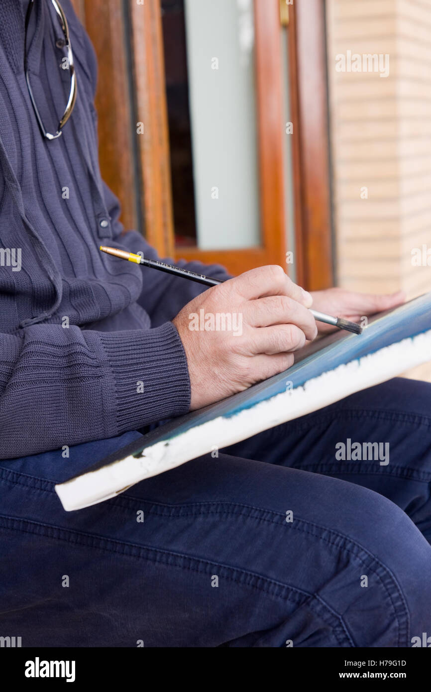painter painting a picture Stock Photo - Alamy