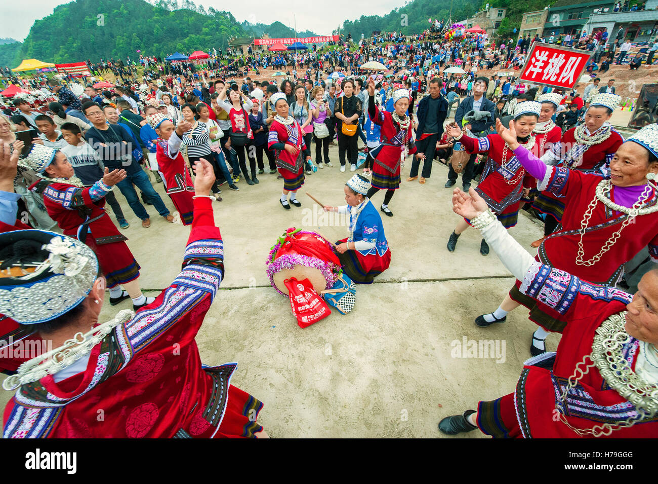 The Miao women dressing their traditional costumes dance in the ...