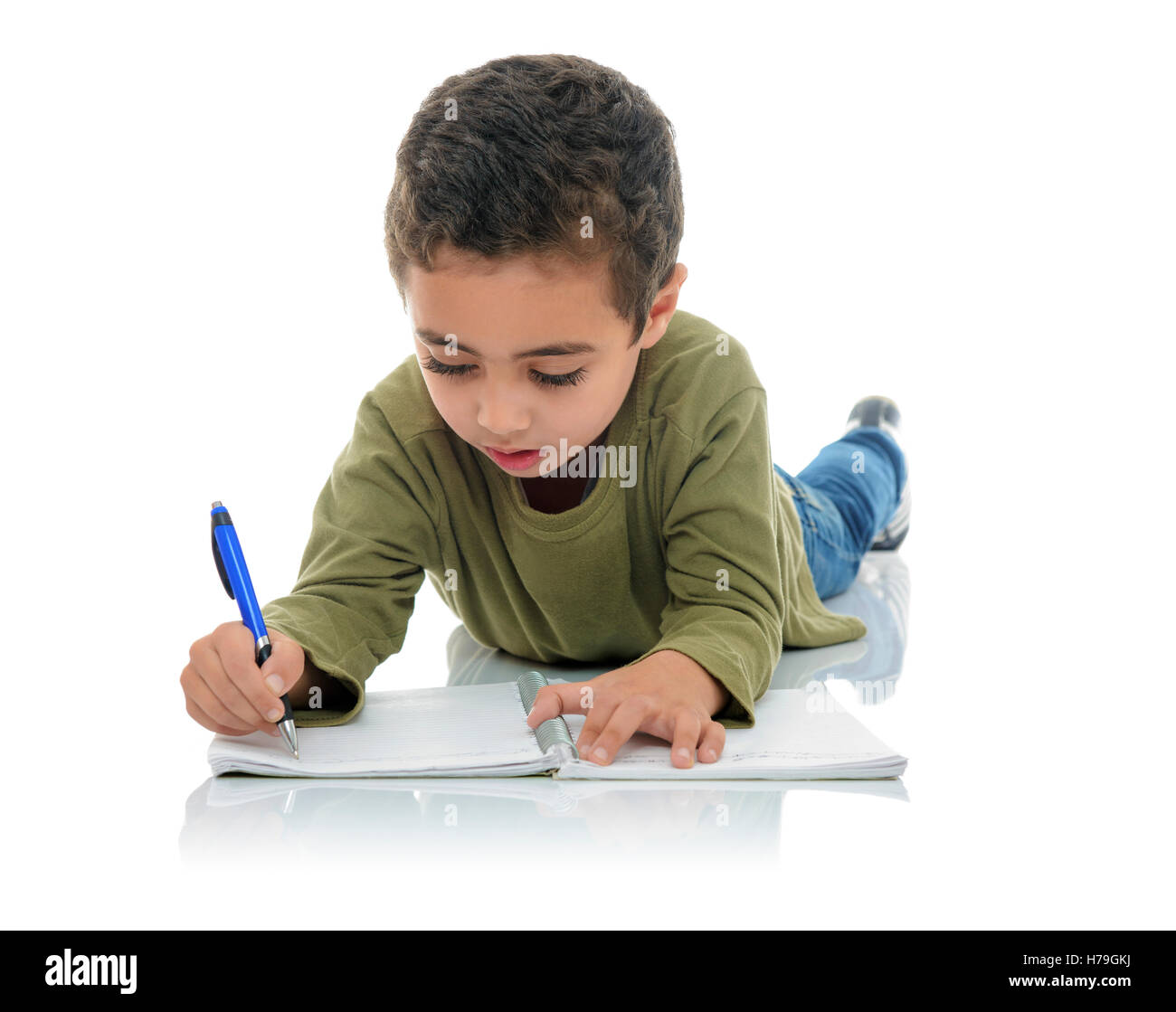 Cute Young Schoolboy Writing Isolated on White Background Stock Photo ...
