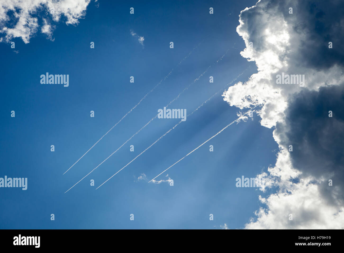 Planes flying across the sky leaving a trail Stock Photo - Alamy