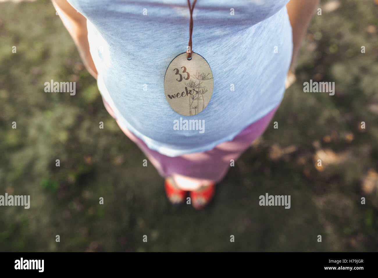 Pregnant woman's belly with a close angle Stock Photo - Alamy