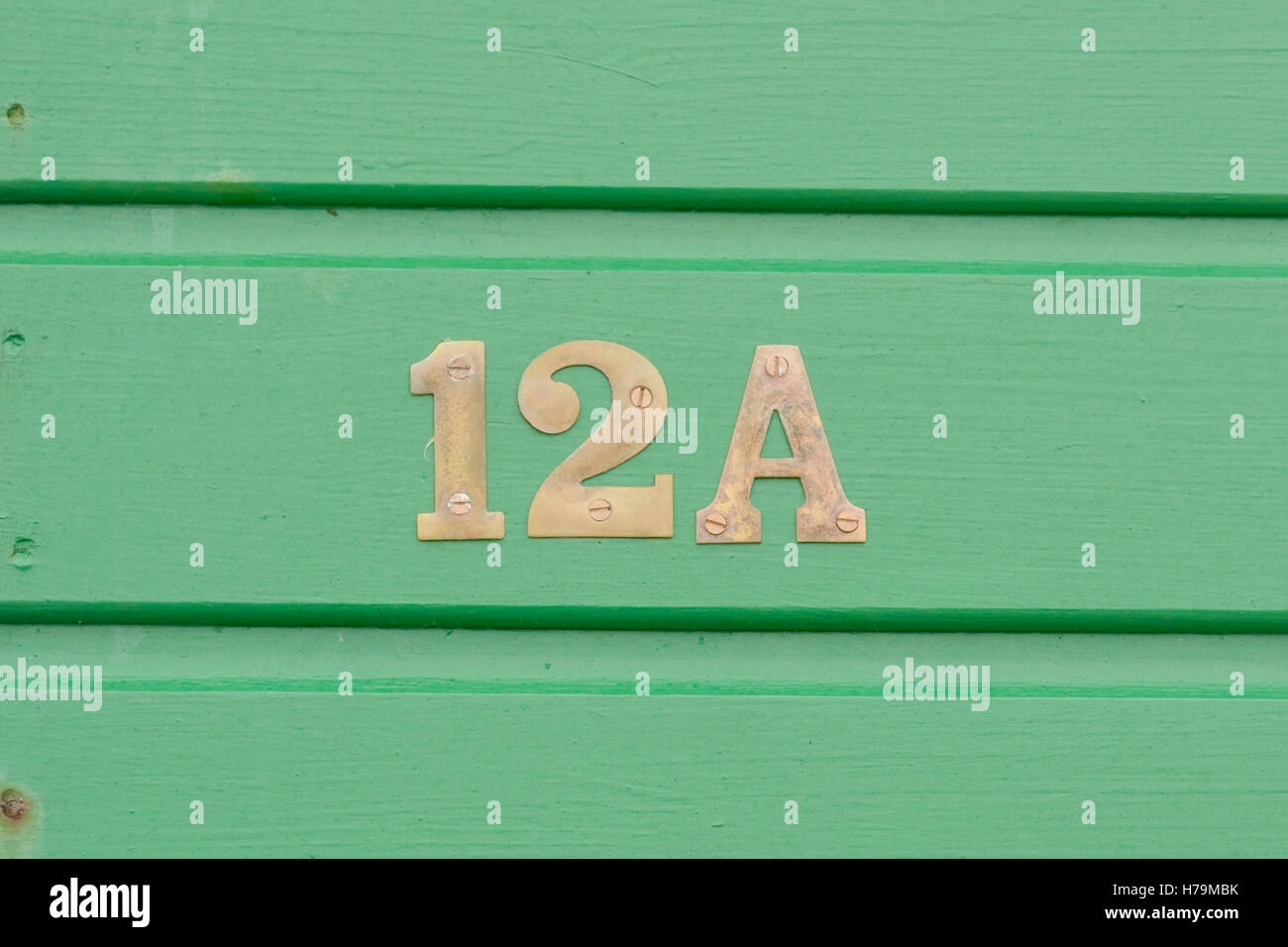House Number 12A sign on door Stock Photo - Alamy