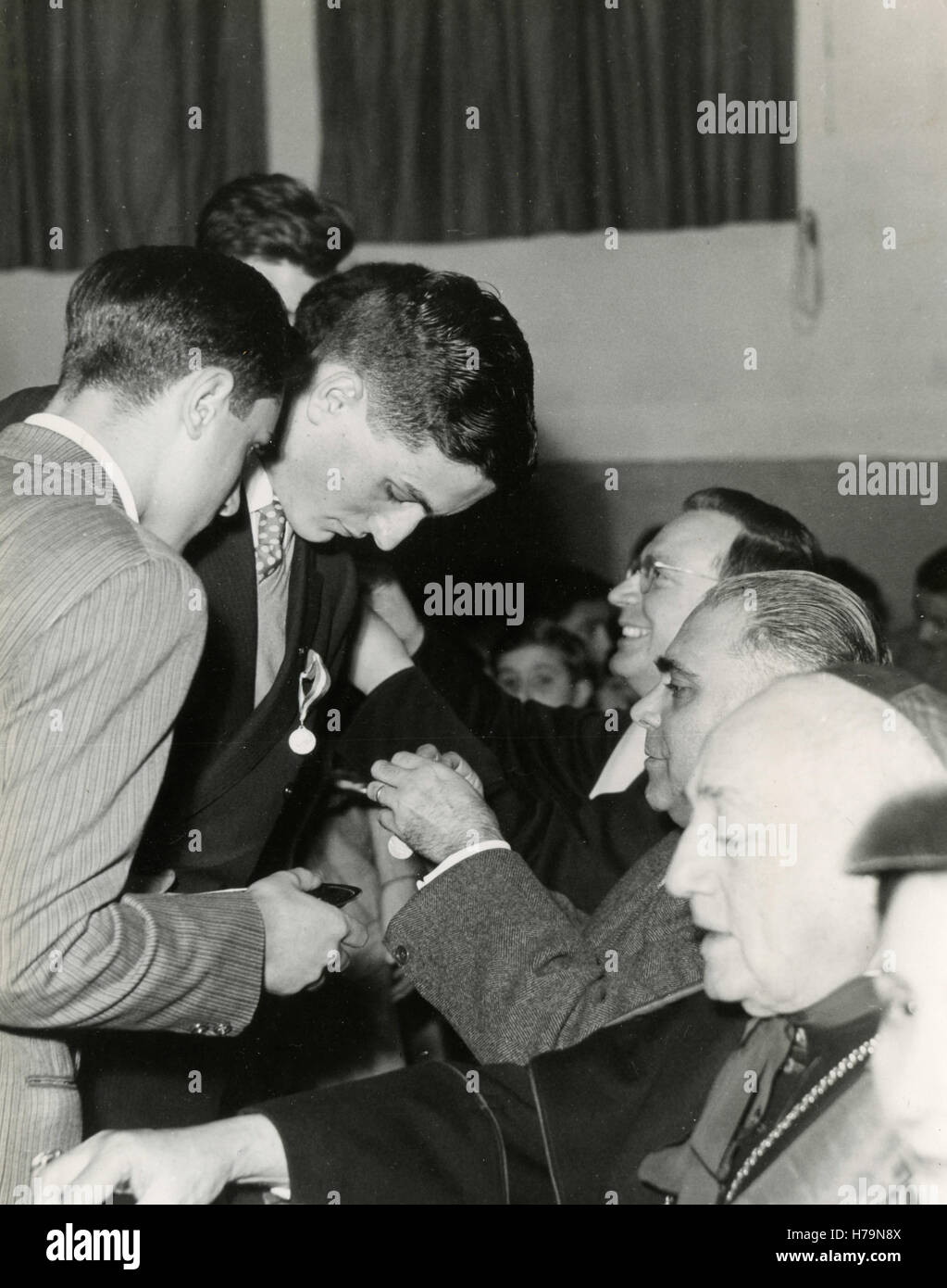 Receiving a medal at school, Italy Stock Photo - Alamy