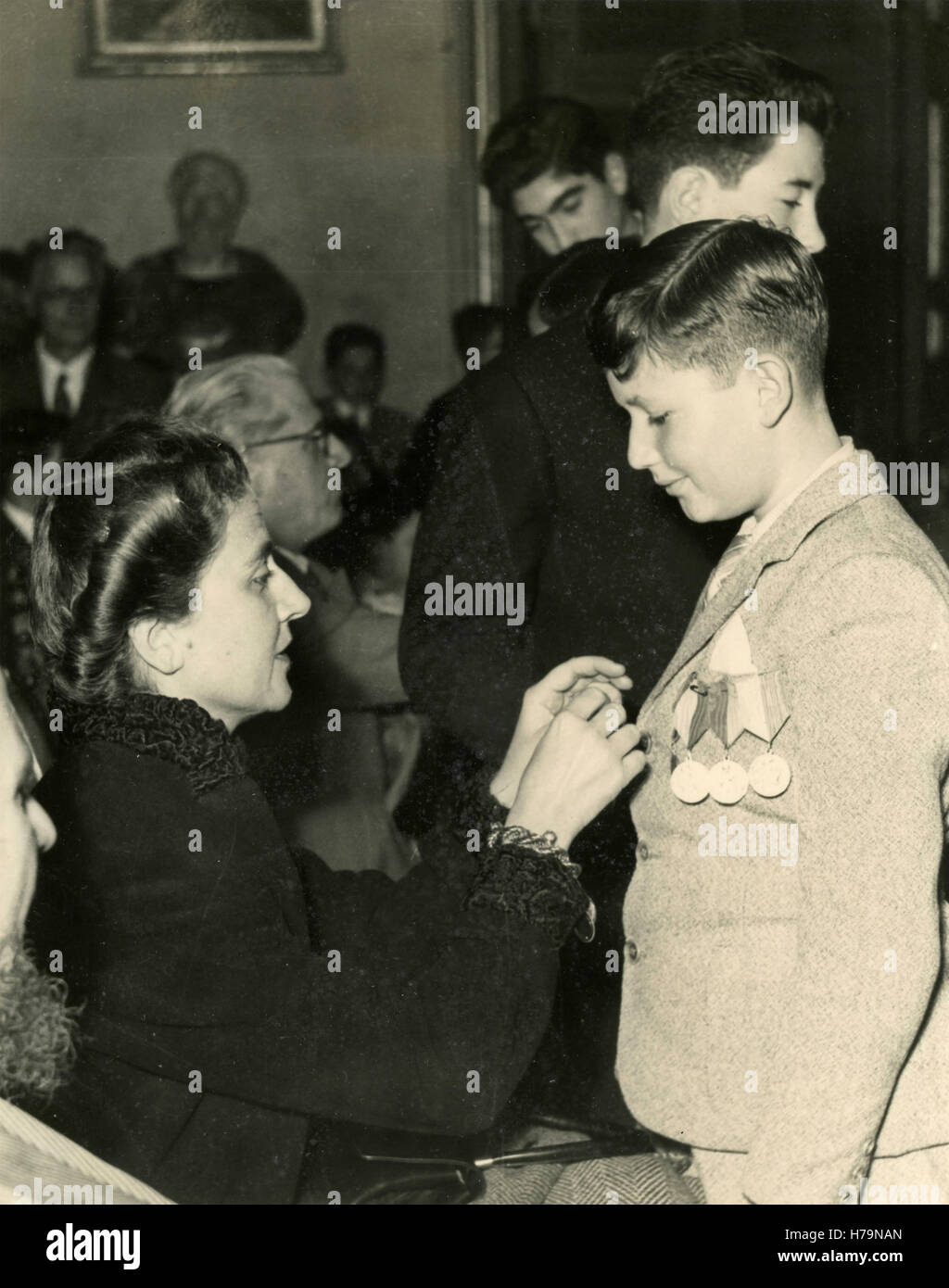 Receiving a medal at school, Italy Stock Photo - Alamy
