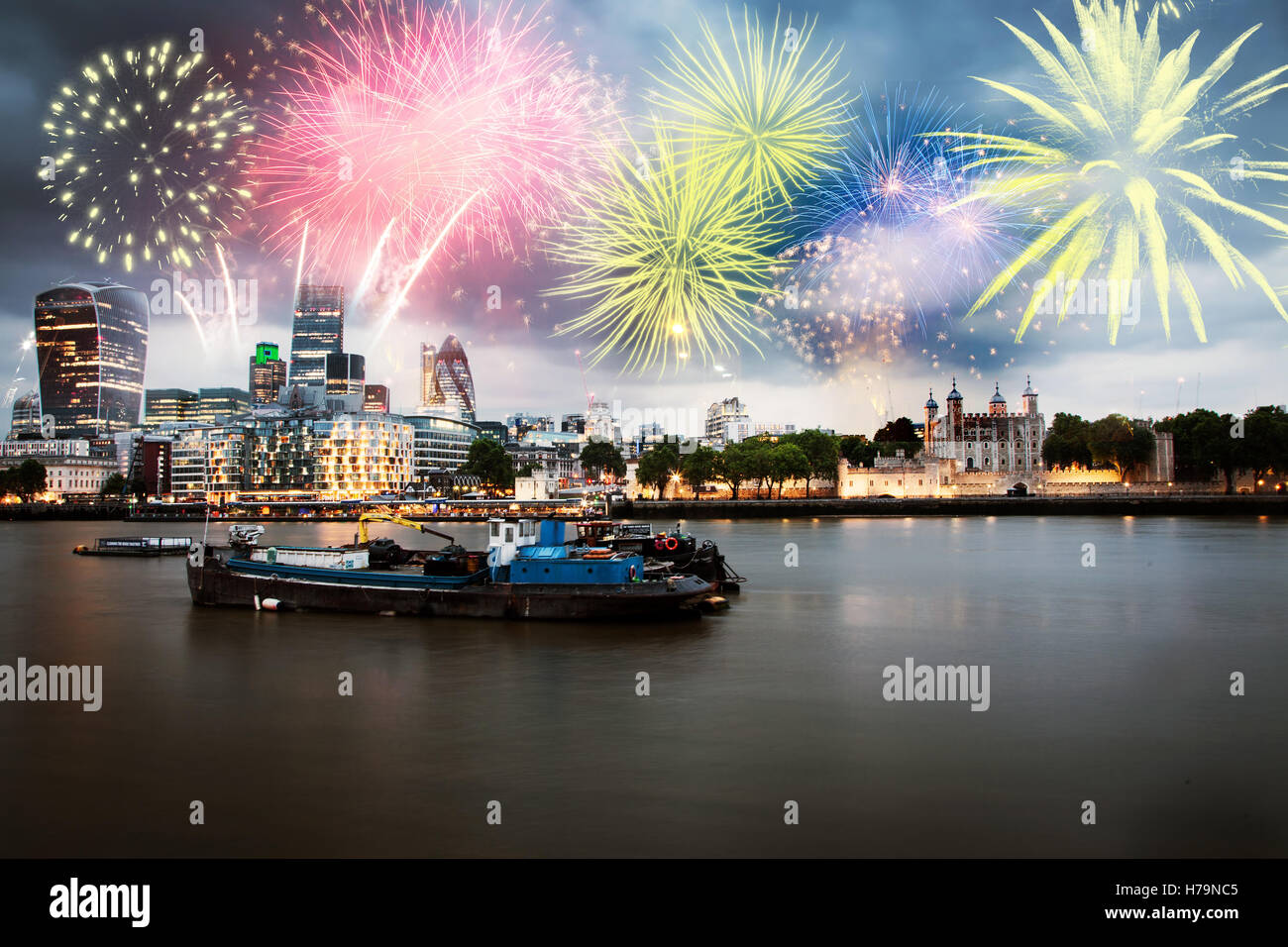 fireworks over the River Thames in London - celebrating New Year in the ...