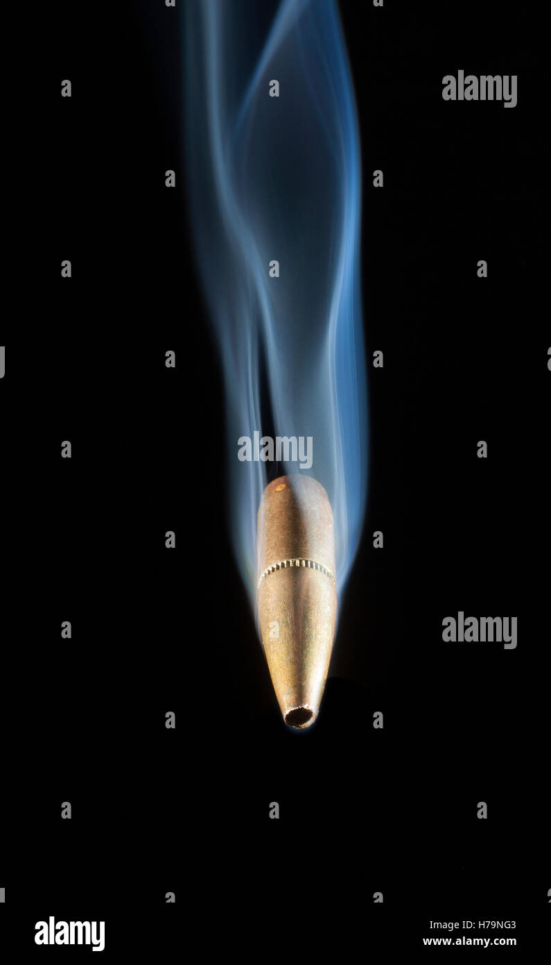 Copper colored bullet and smoke that look like they are coming closer ...