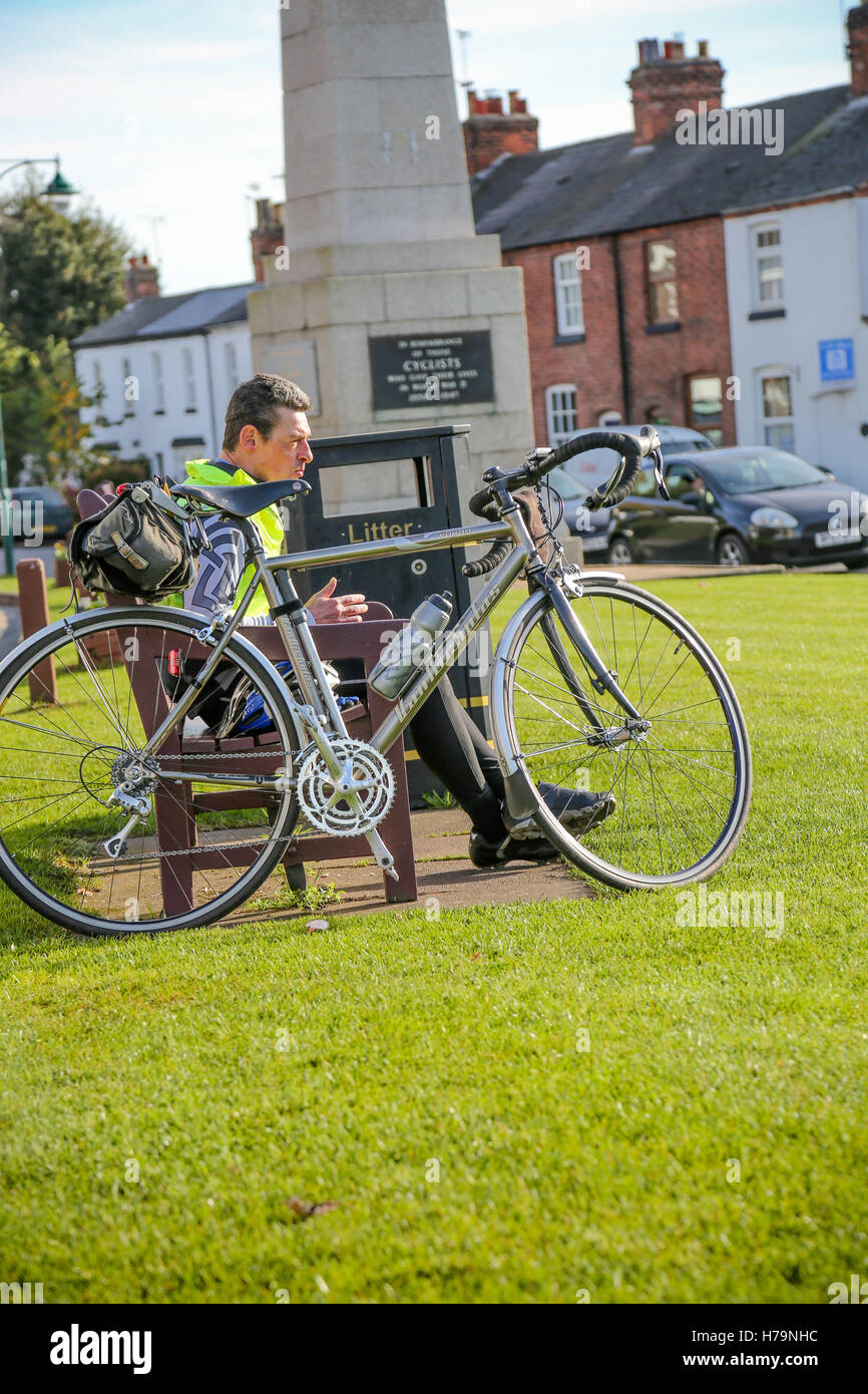 A cyclist stops for a break at the Cyclists Memorial in Meriden. The ...