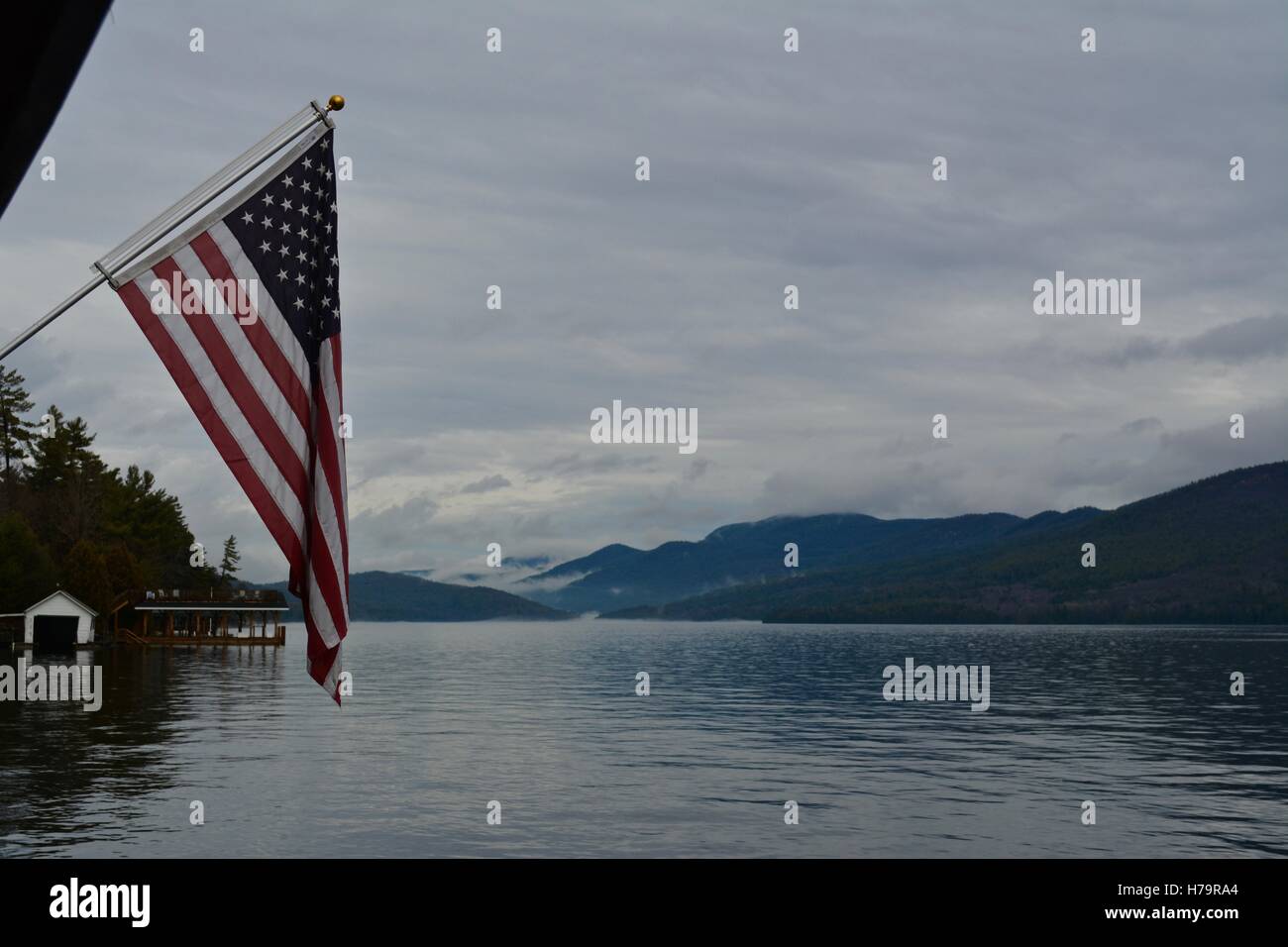 The United States of America flag hanging over Lake George in Upstate ...