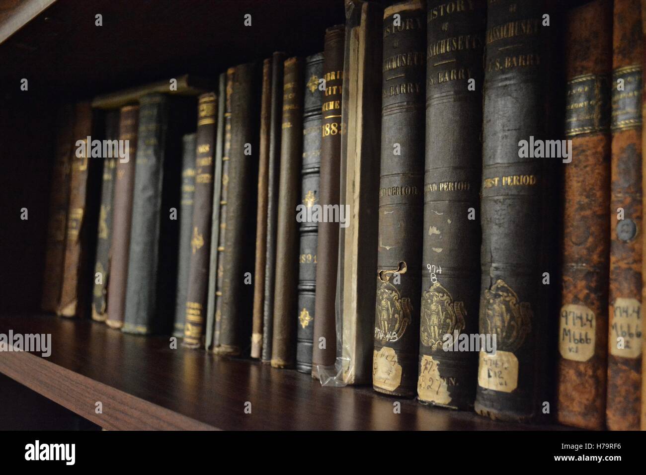 Antique books on a shelf Stock Photo - Alamy