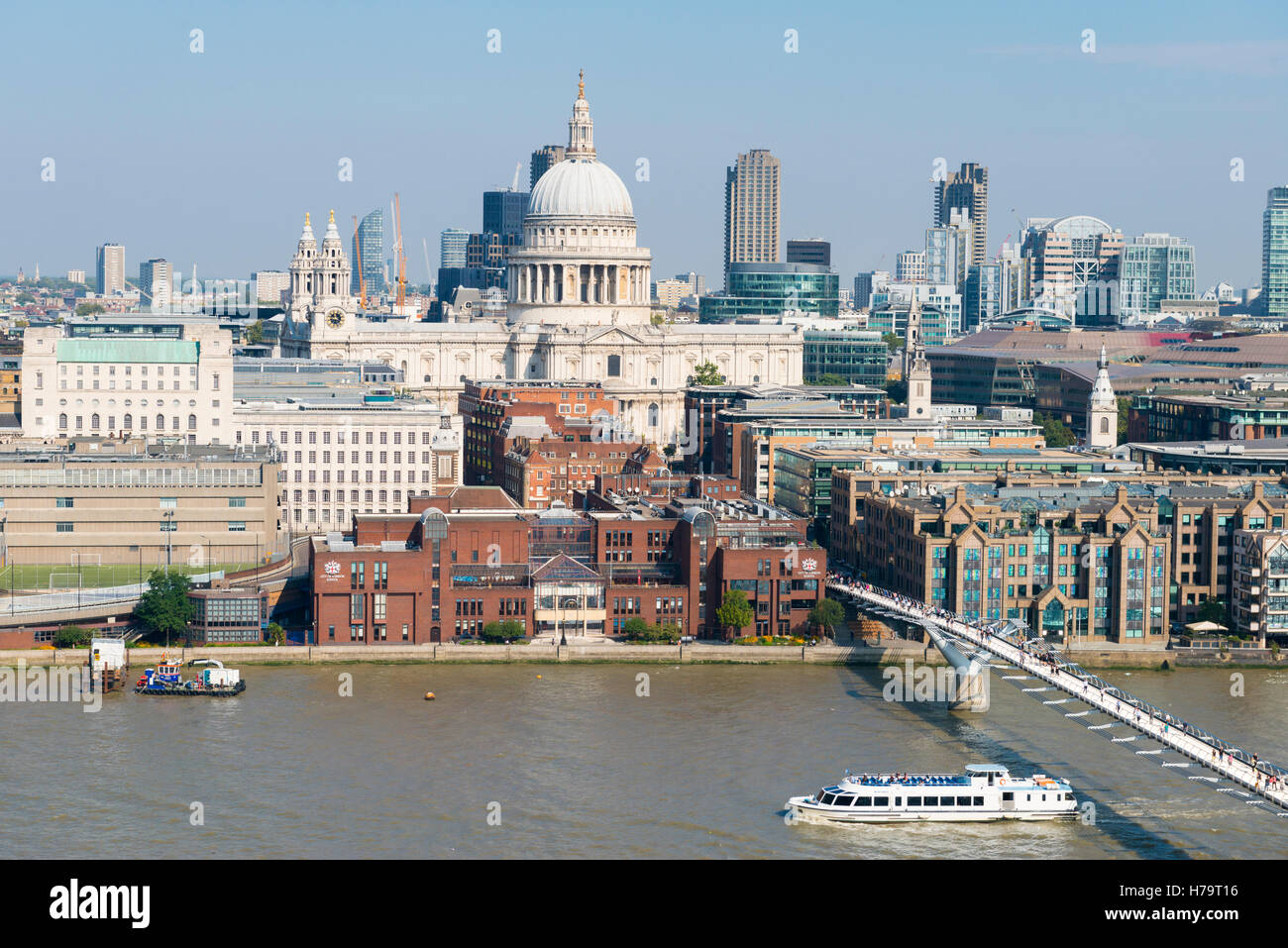 London Southbank view of Milenium Bridge & St Pauls Cathedral over ...