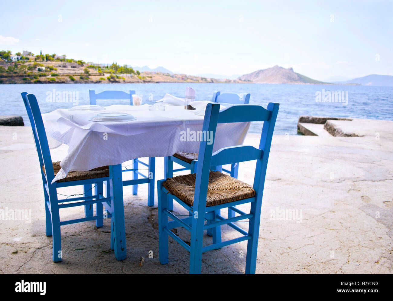 traditional tavern at a greek island in front of the Aegean sea Stock ...