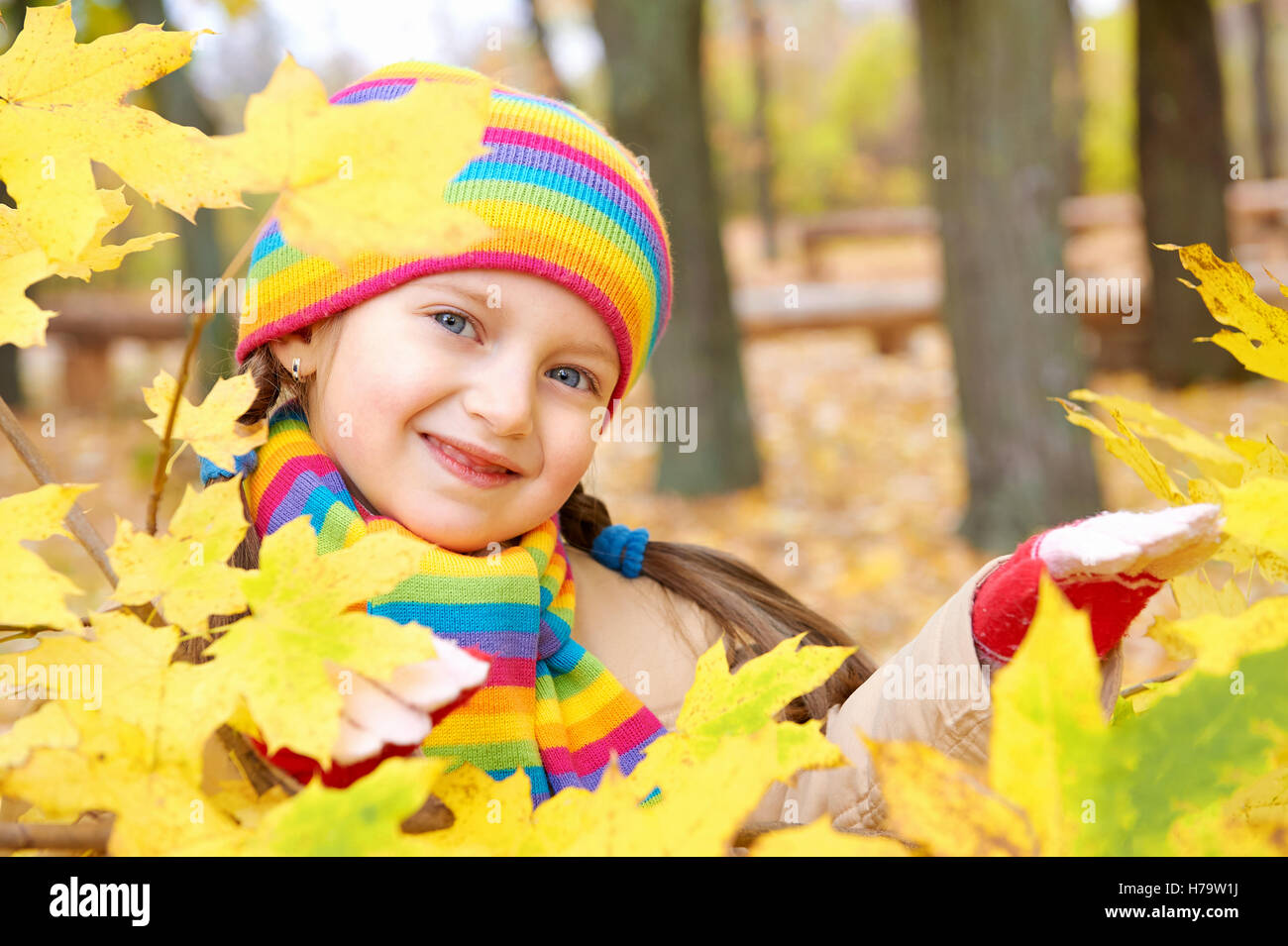 girl child in autumn forest portrait, face closeup Stock Photo - Alamy