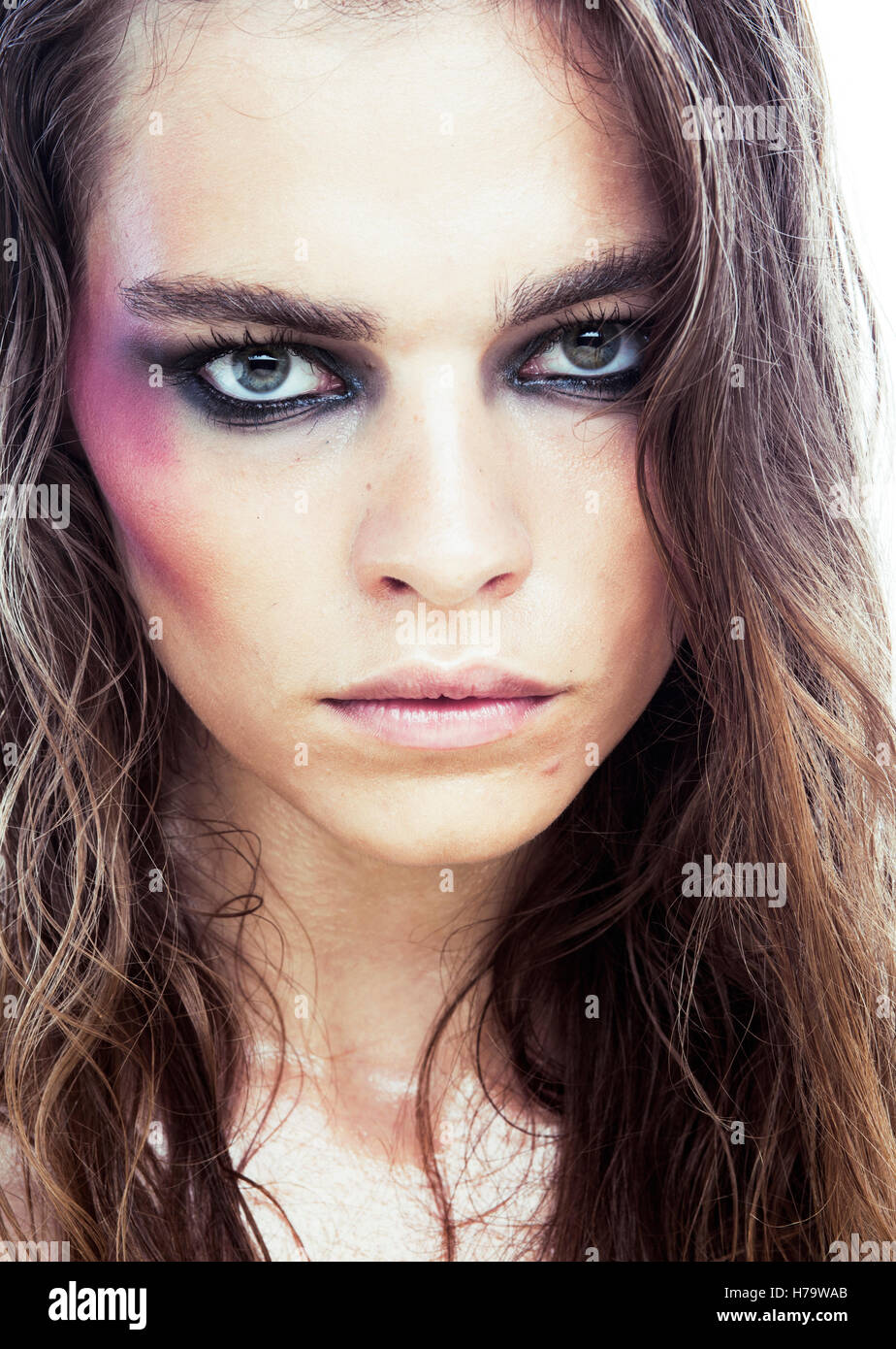 young beauty woman with makeup like shiner on face close up isolated ...
