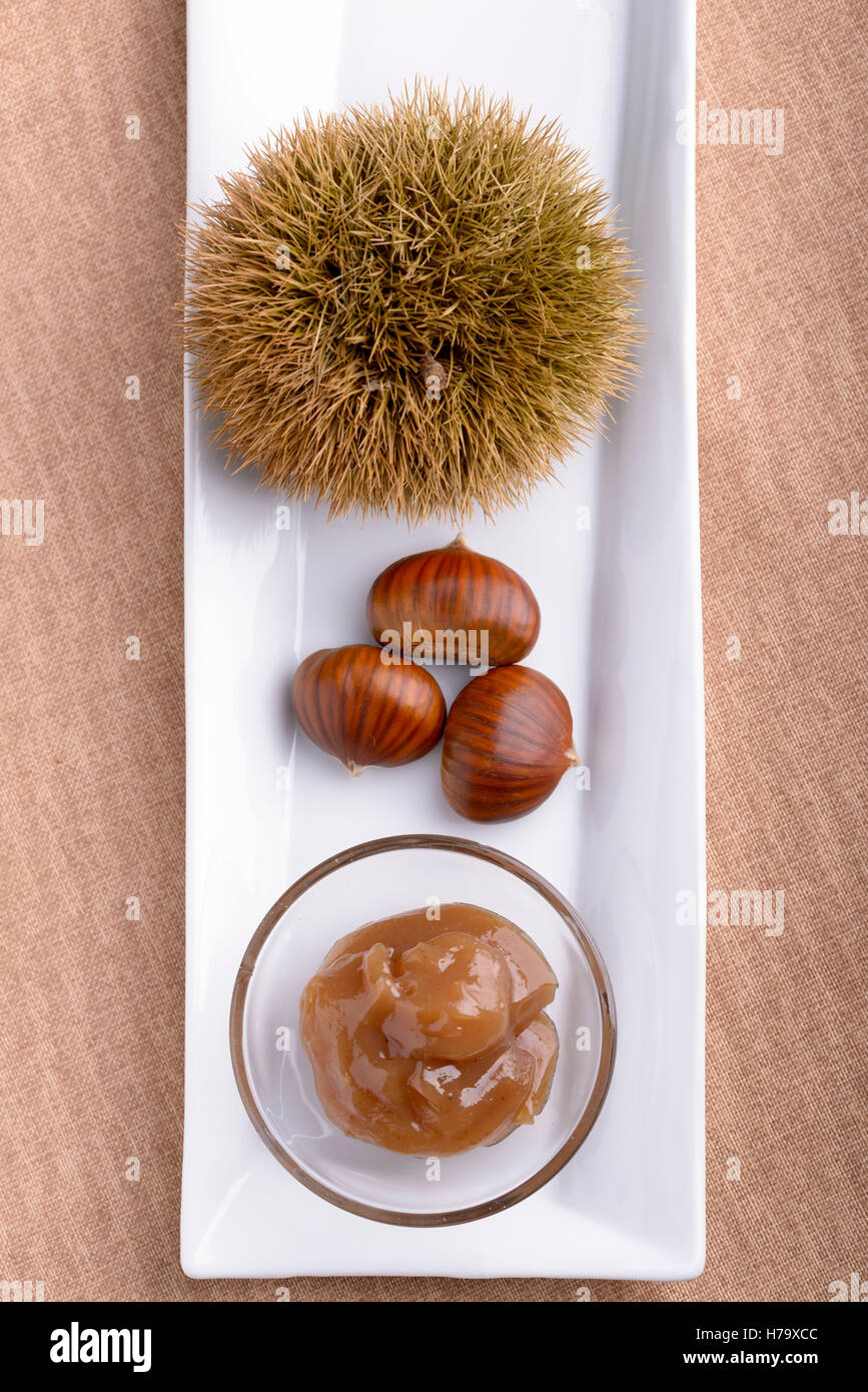 chestnut jam, chestnut and curly on white dish Stock Photo - Alamy