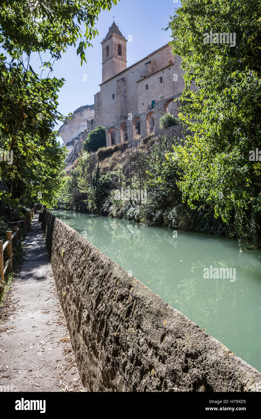 Passage along the river Jucar, right the church of San Andres, styles ...
