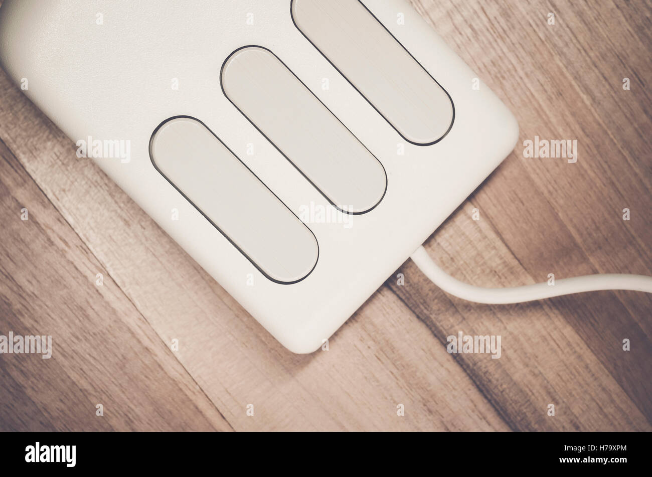 vintage corded optical mouse on a wood surface Stock Photo - Alamy