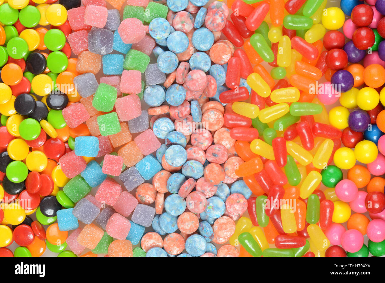 assorted candy in a row Stock Photo - Alamy