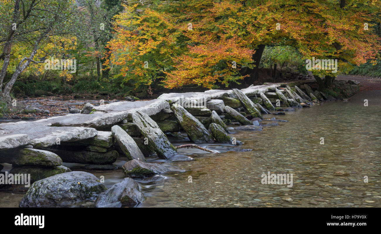 Autumn at Tarr Steps clapper bridge crossing the River Barle, Exmoor ...