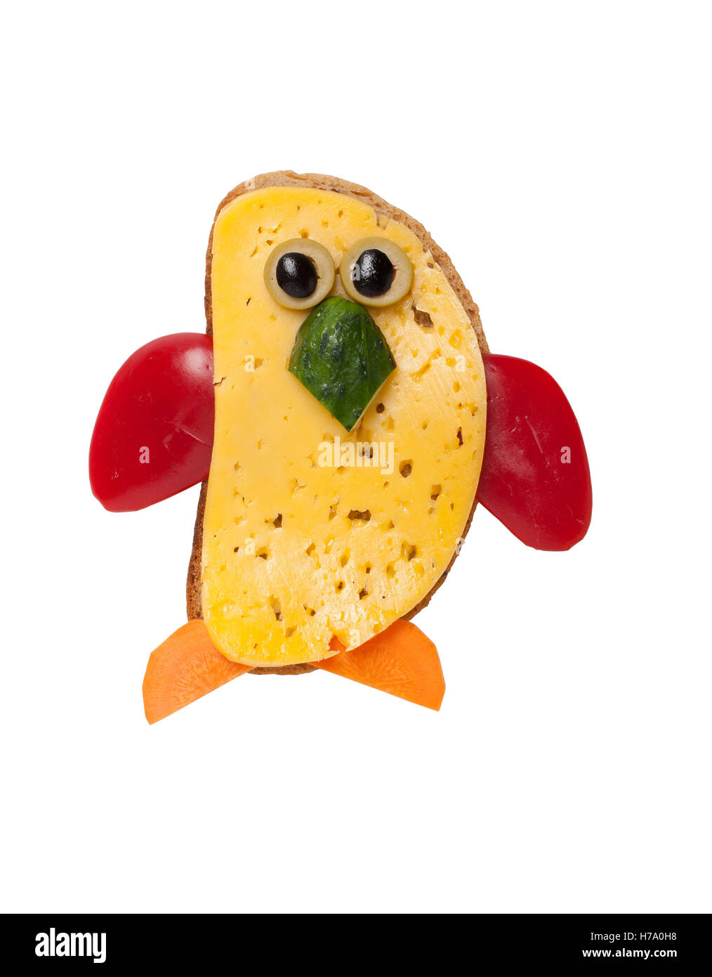 Penguin made of bread and cheese on white background Stock Photo - Alamy