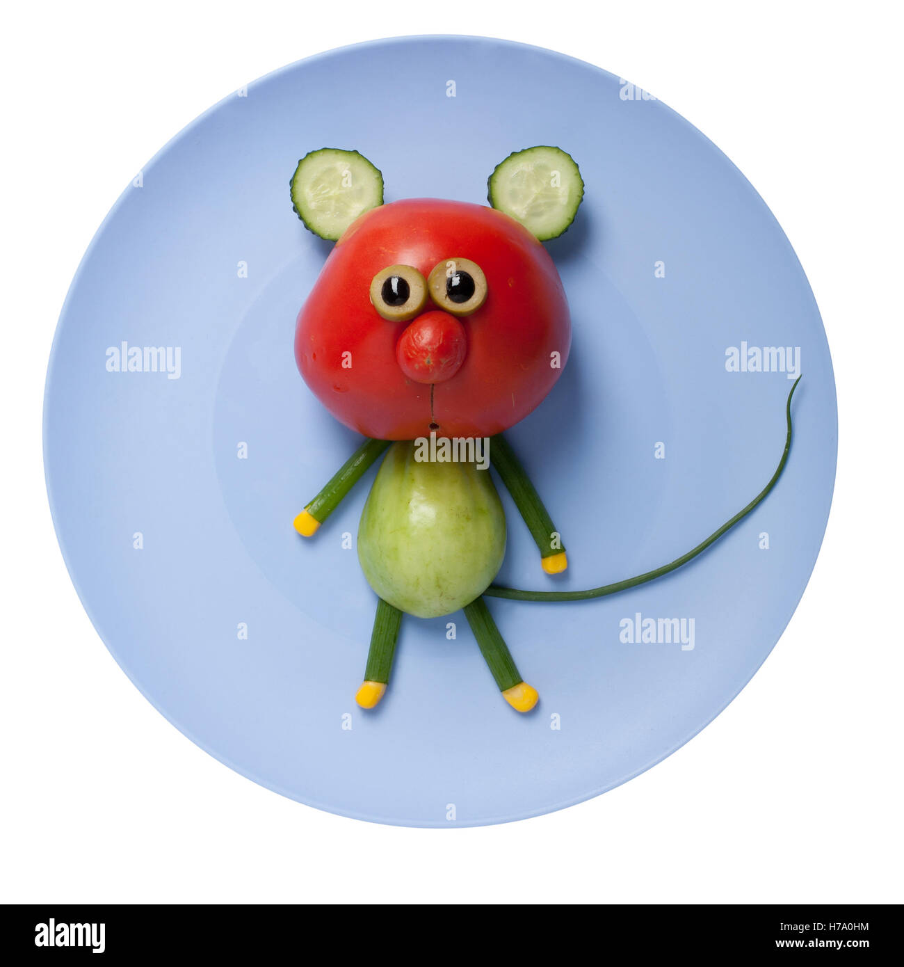 Funny mouse made of red and green tomato on plate Stock Photo - Alamy
