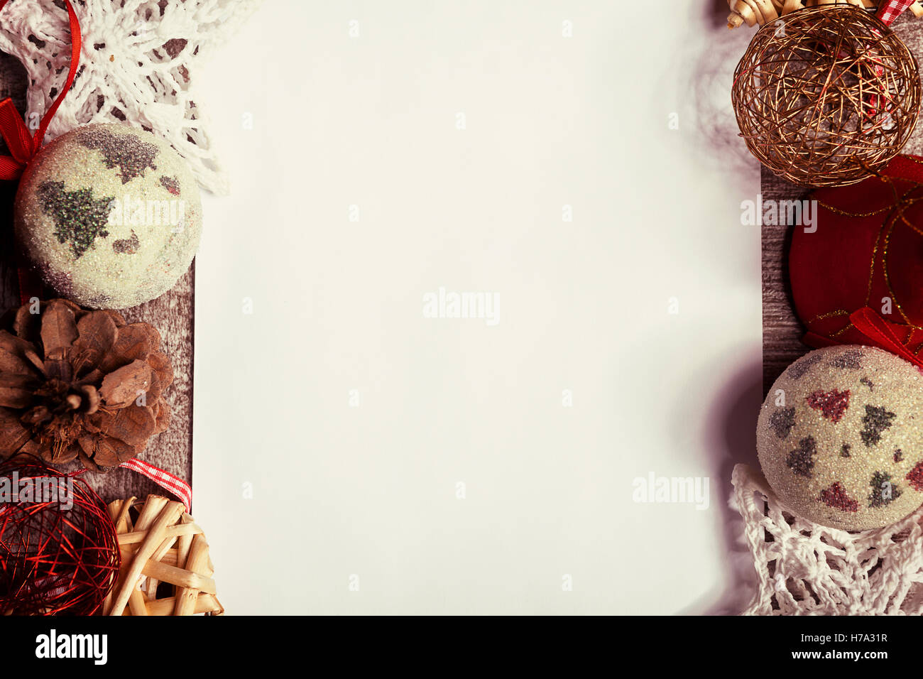 Letter next to christmas ornaments in vintage toning. Mail to Santa ...