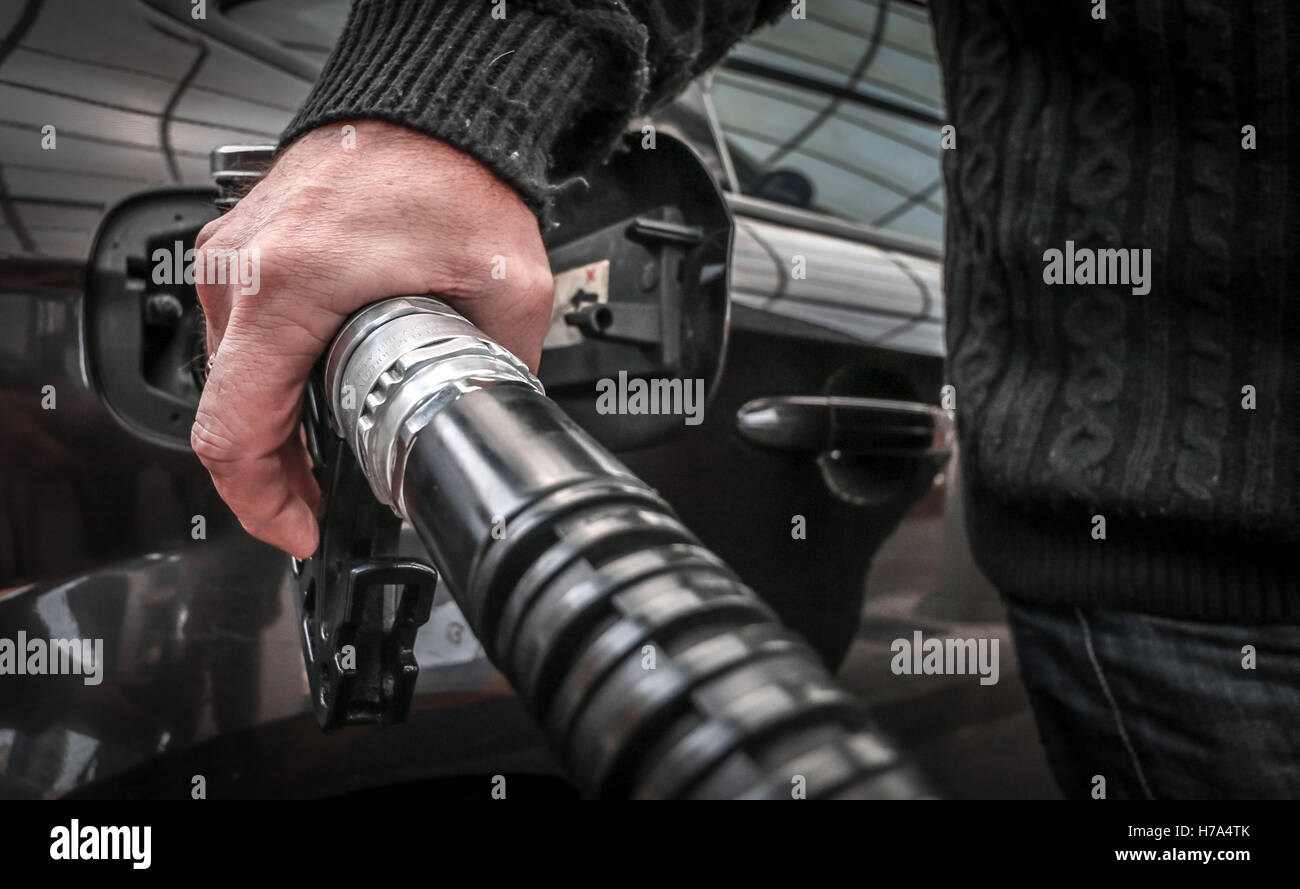 Hand pumping gas hi-res stock photography and images - Alamy