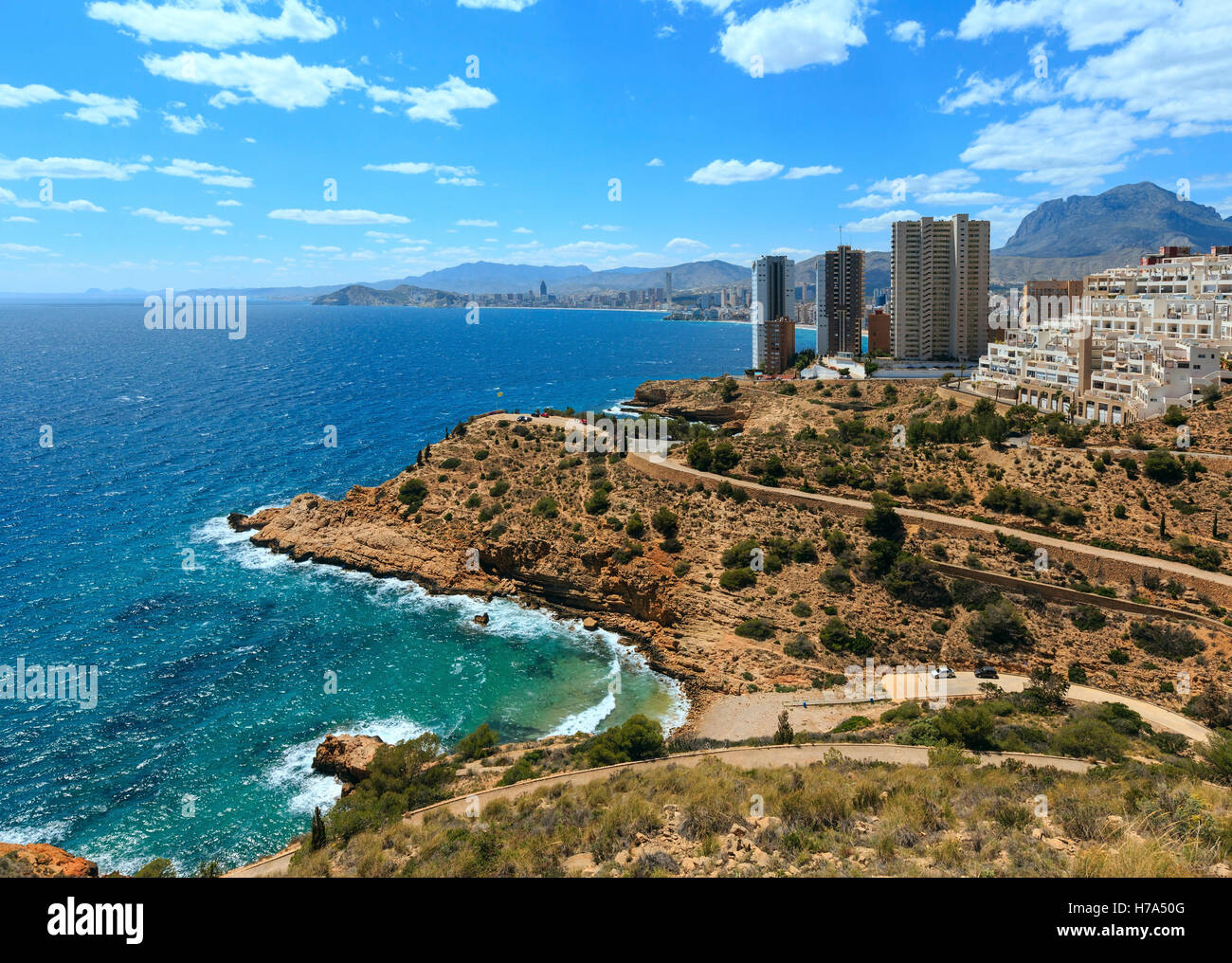 Skyscrapers on rocky coast. Benidorm city coastline summer view (Costa ...
