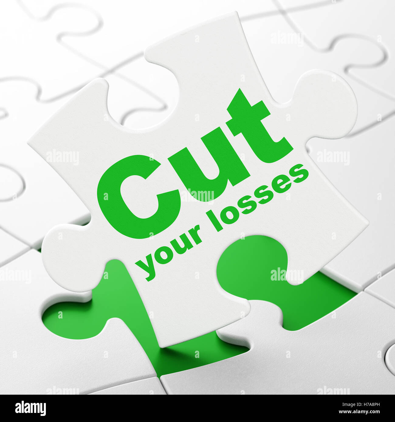 Finance concept: Cut Your losses on puzzle background Stock Photo - Alamy
