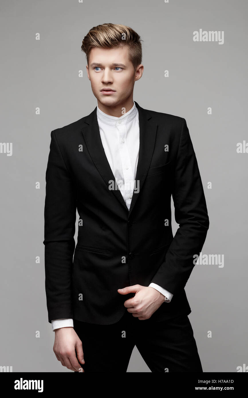 Portrait of a young handsome business man Stock Photo - Alamy