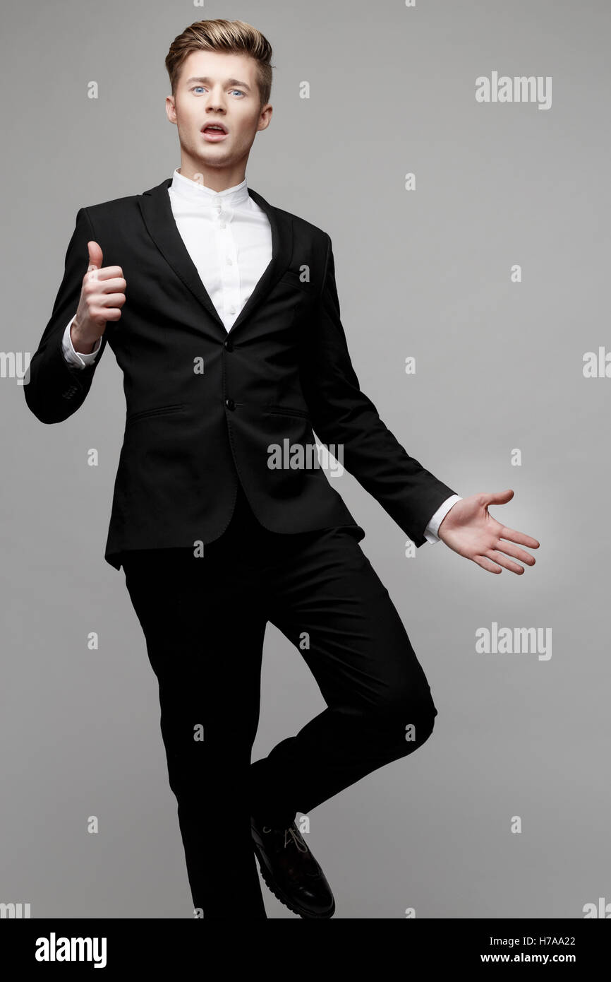 Portrait of a young handsome business man Stock Photo - Alamy