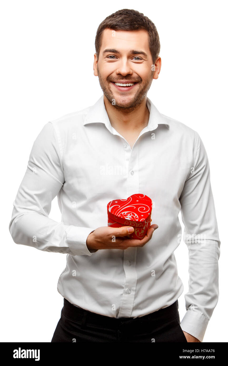 Young man carries heart shaped box Stock Photo - Alamy