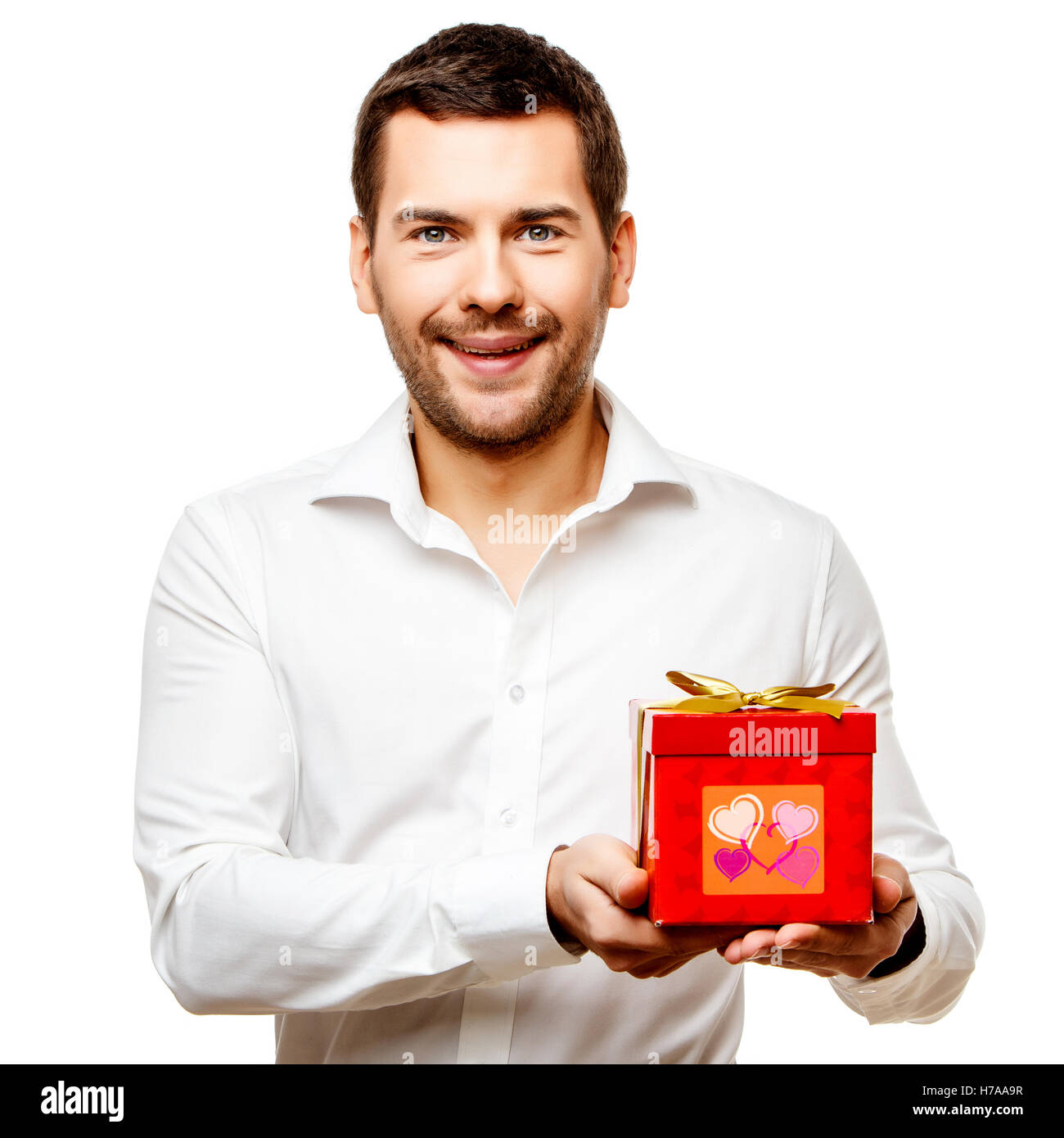 Young man carries heart shaped box Stock Photo - Alamy