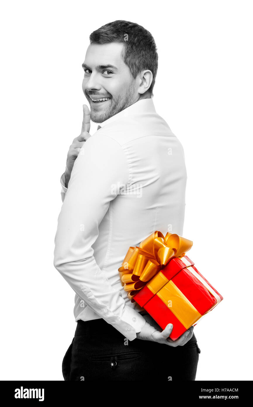 Young man carries heart shaped box Stock Photo - Alamy