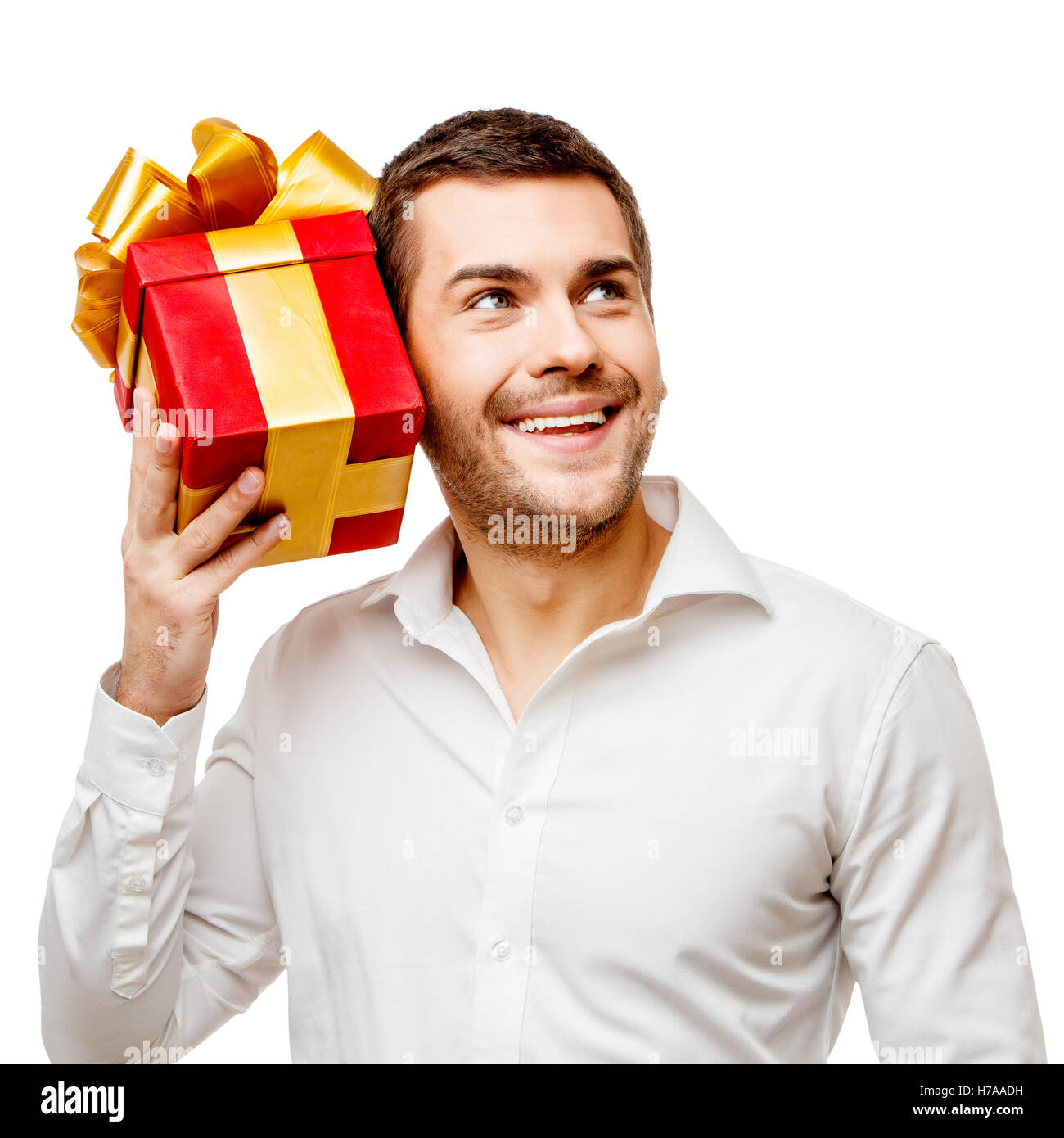 Young man carries heart shaped box Stock Photo - Alamy
