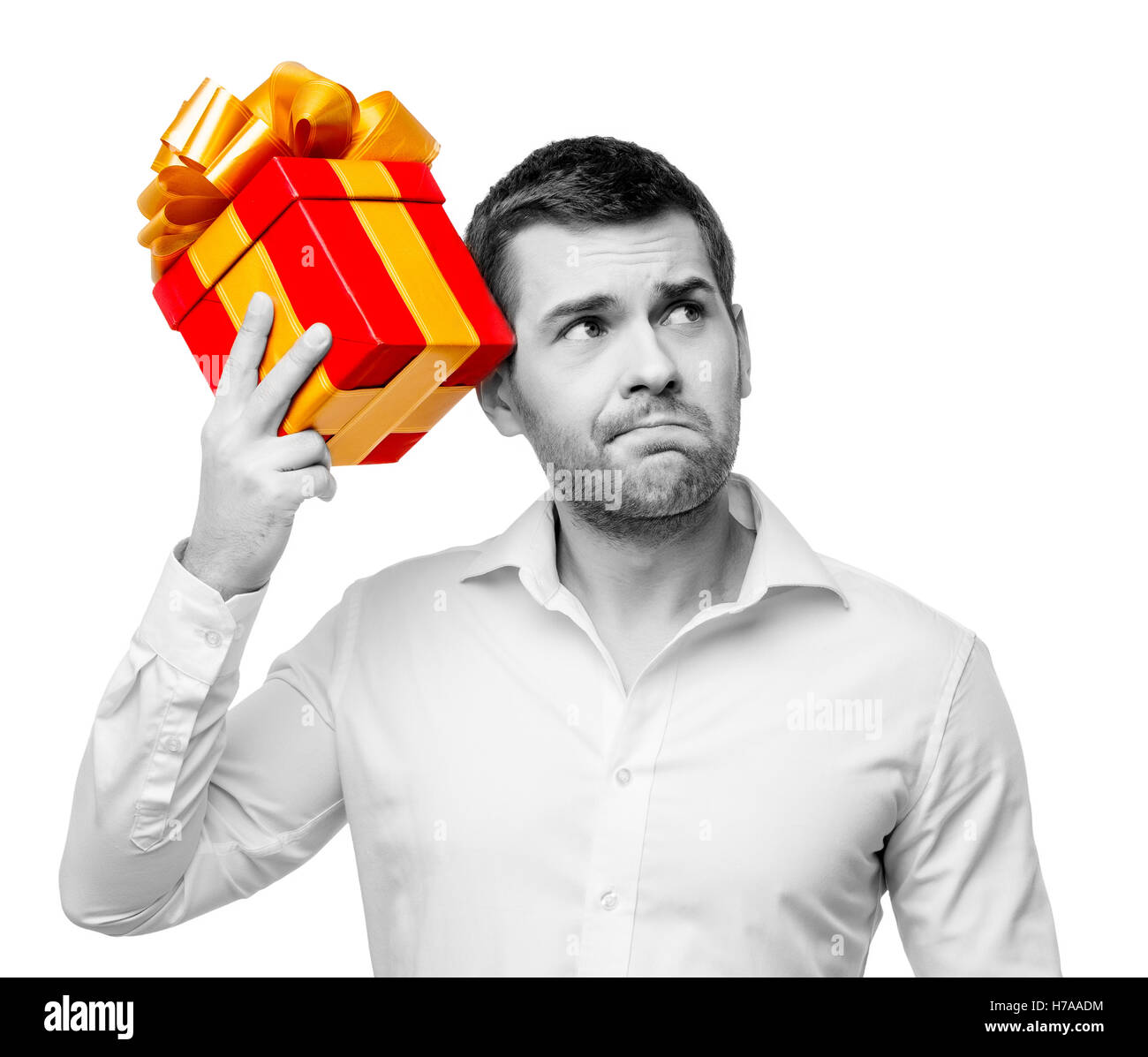 Young man carries heart shaped box Stock Photo - Alamy