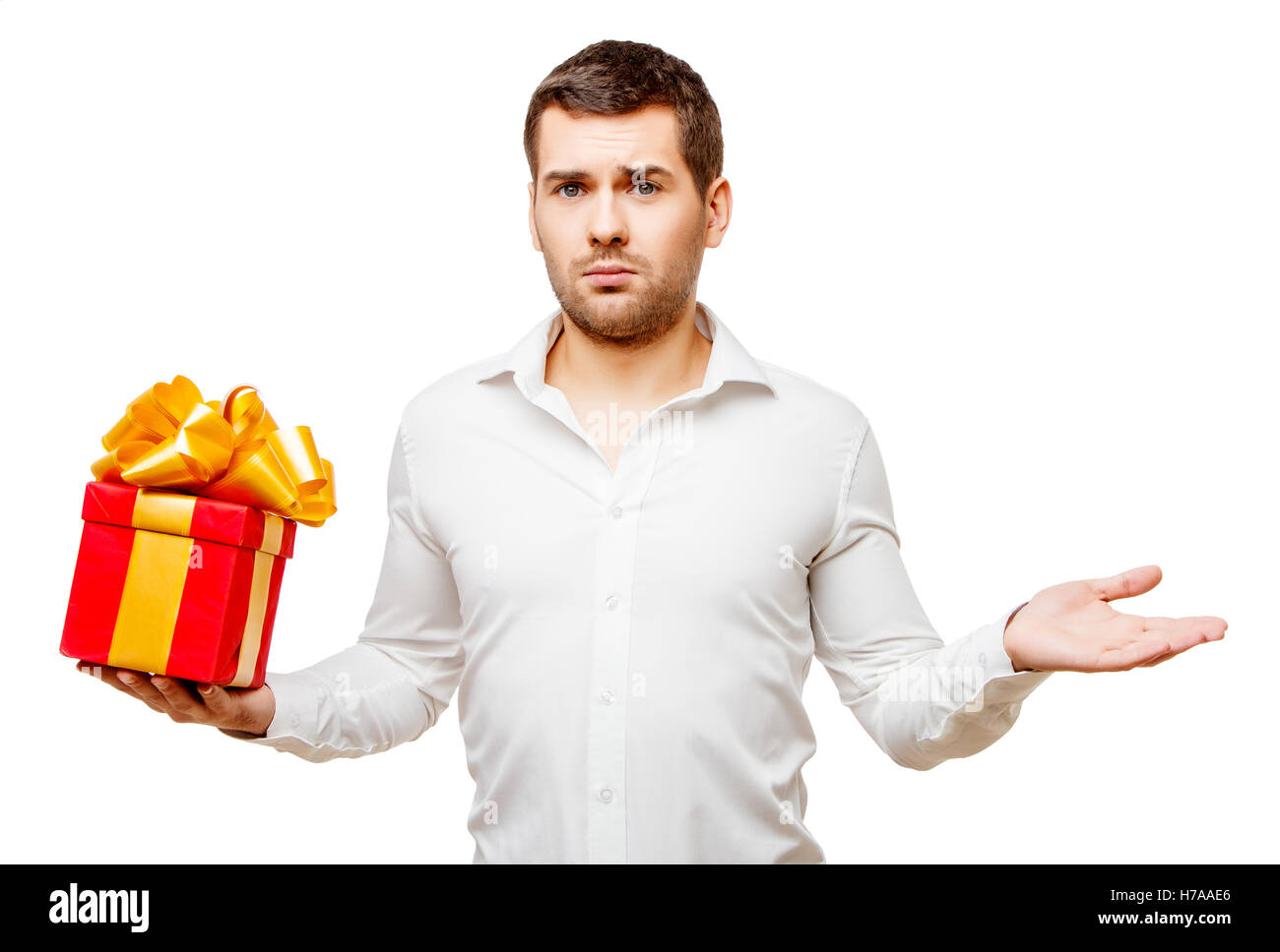 Young man carries heart shaped box Stock Photo - Alamy