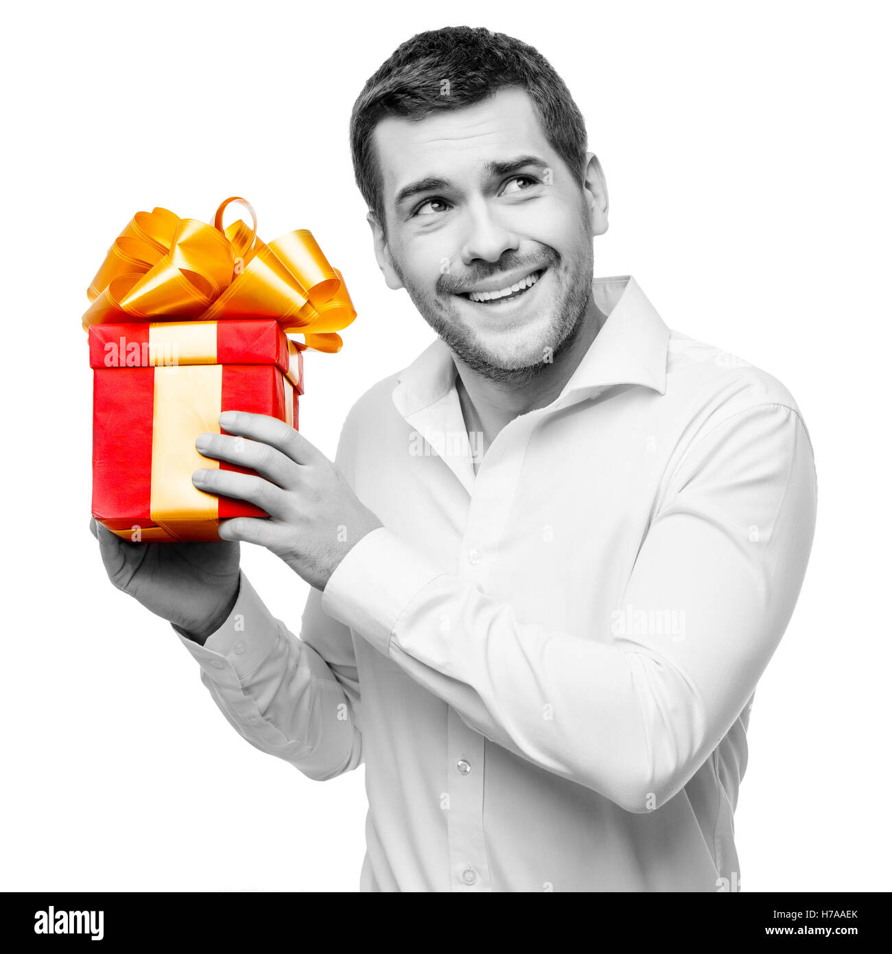 Young man carries heart shaped box Stock Photo - Alamy